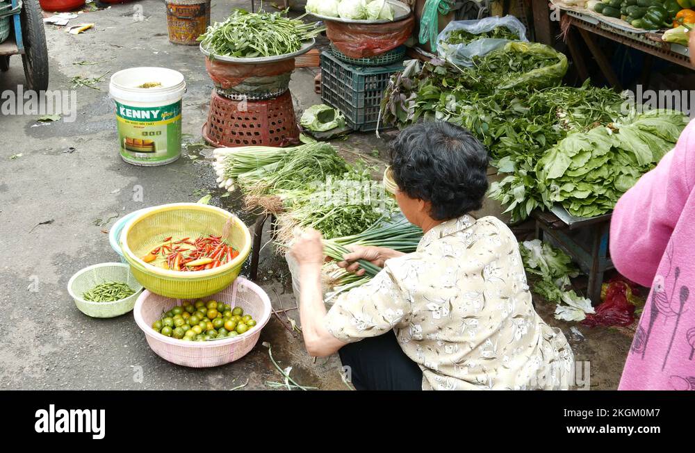 A vegetable vendor in the market in Ho Chi Minh City Stock Video ...