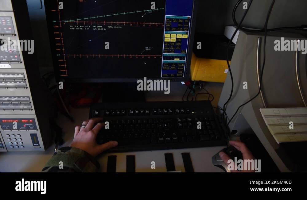 Airman monitoring computer screen in emergency operation center Stock ...