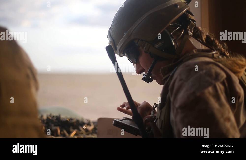 Soldier using handheld computer during offensive air support exercise ...
