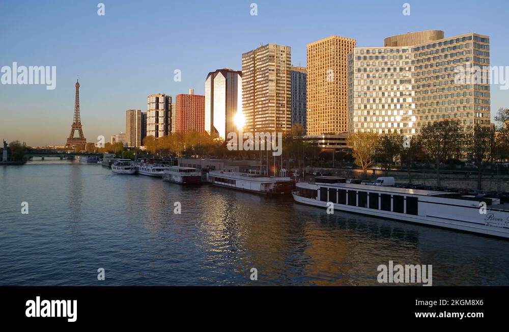 River Seine with high-rise buildings on the Left Bank, and Eiffel Tower ...