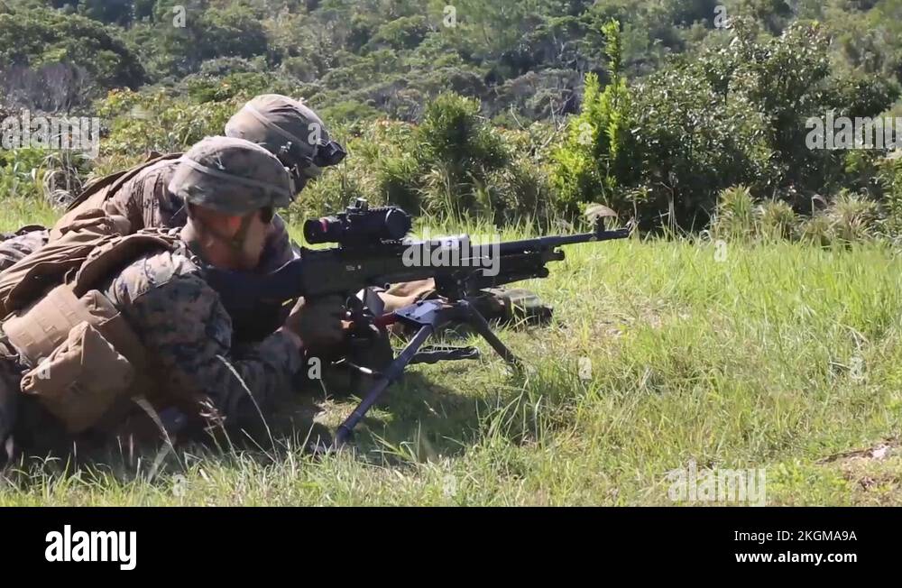 Soldiers in prone position firing assault rifle 1 Stock Video Footage ...