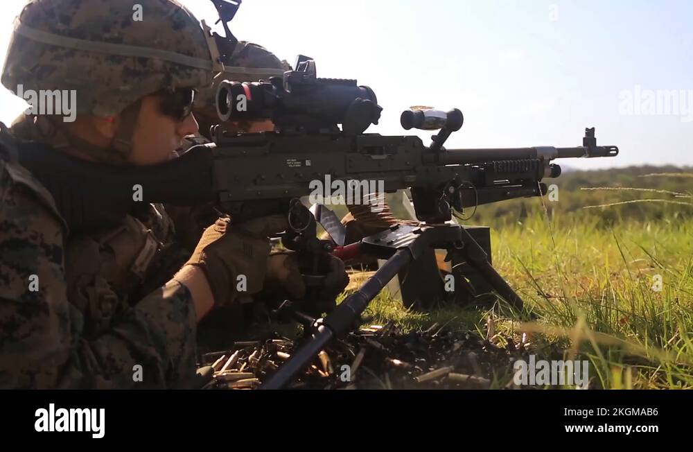 Soldiers in prone position firing assault rifle 5 Stock Video Footage ...