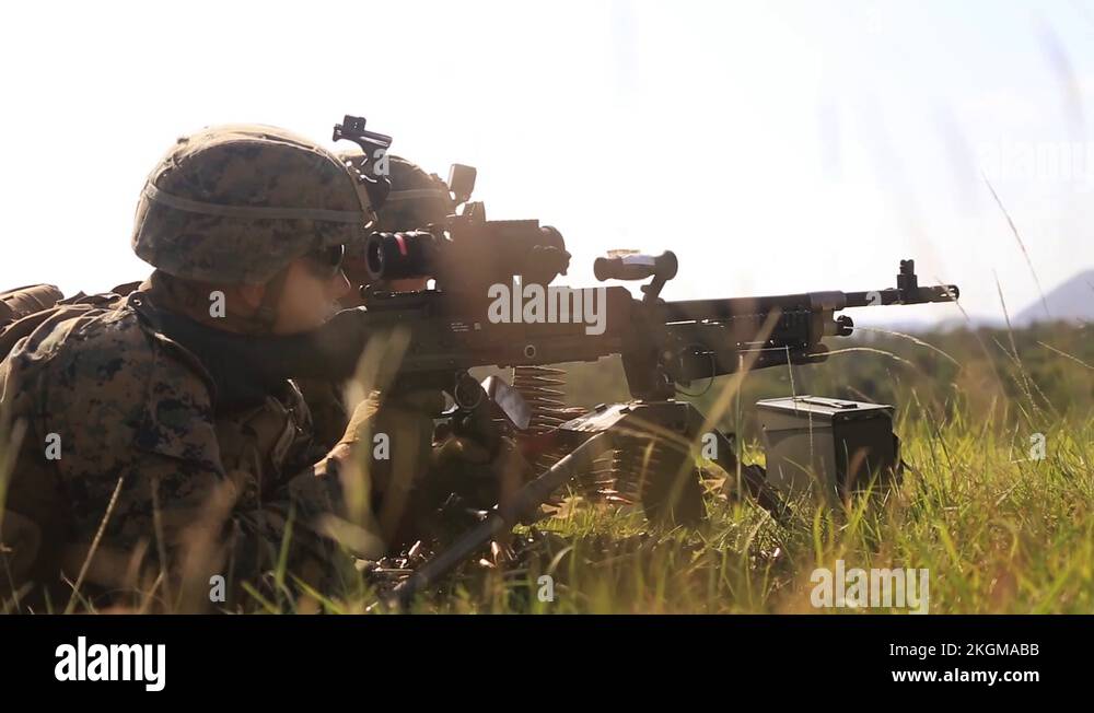 Soldiers in prone position firing assault rifle 4 Stock Video Footage ...