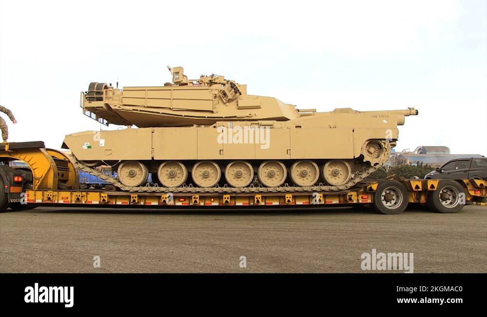 M1 Abrams tank driving off lowbed trailer Stock Video Footage - Alamy