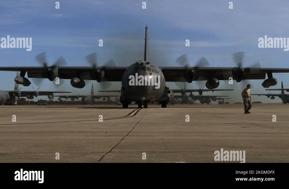 Lockheed C-130 preparing to take off from runway Stock Video Footage ...