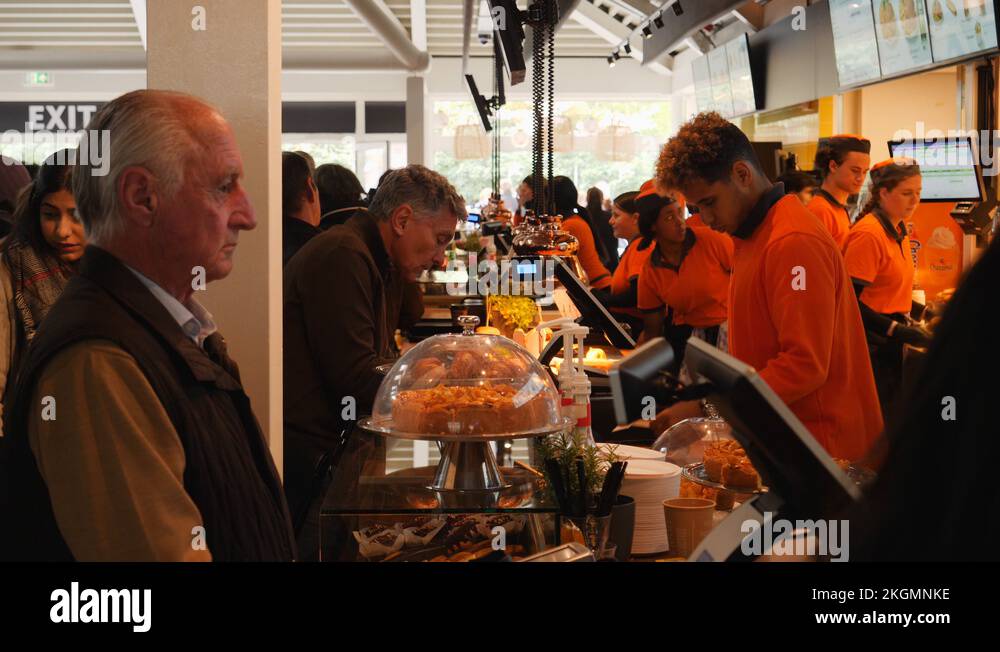 KEUKENHOF PARK NETHERLANDS Many people staying in food court queue line ...