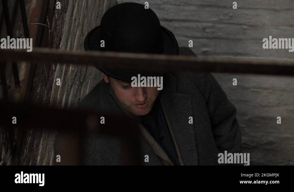 Portrayal of Gangster/Mobsters meeting in a back-alley for a shake-down ...