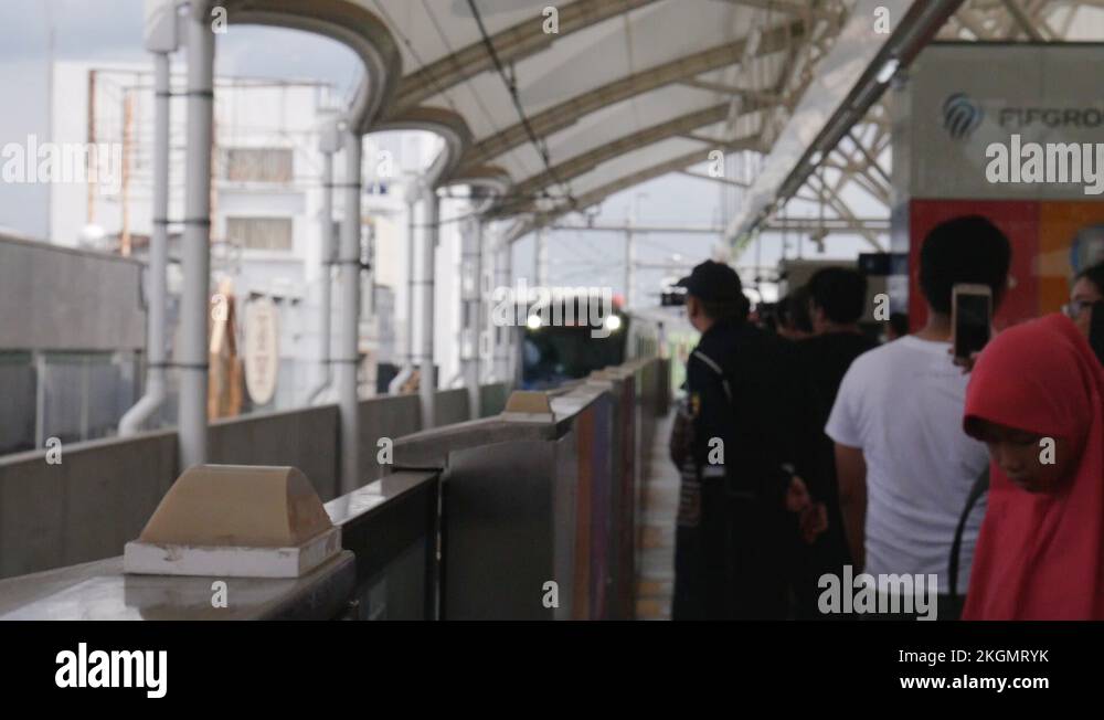 Jakarta MRT - Commuter Arrive at Station - Passenger Step In to Stock ...