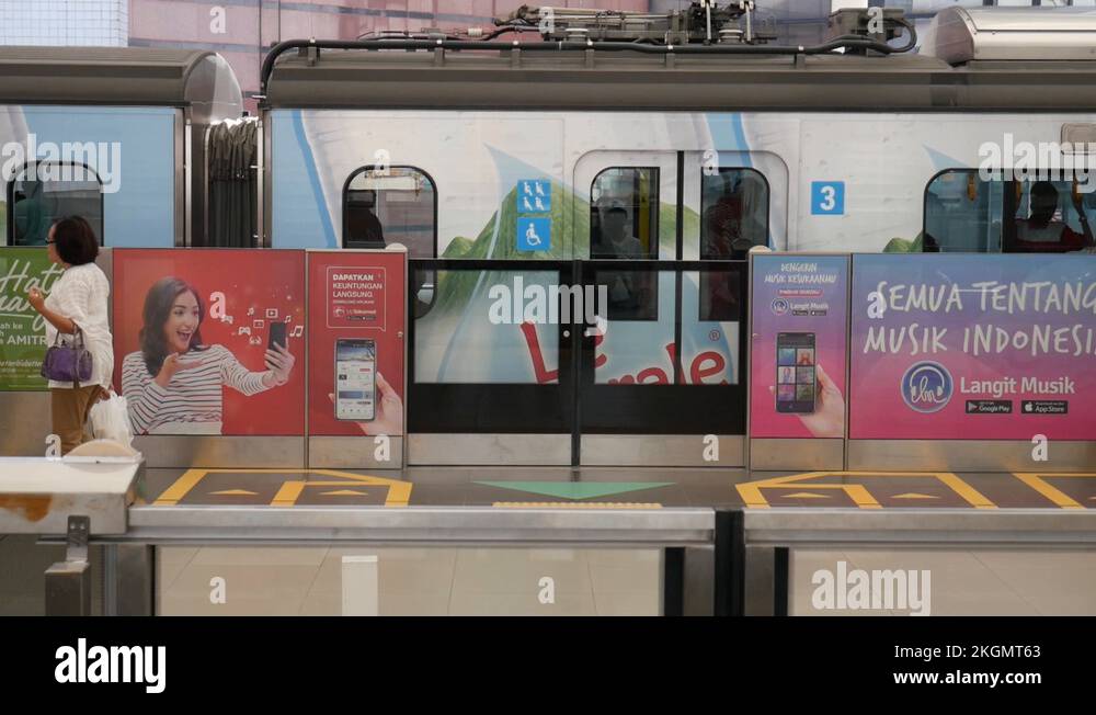 Jakarta MRT - Commuter Arrive at Station - Passenger Step Out Stock ...