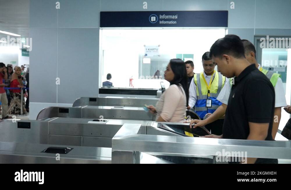 Jakarta MRT - the passenger exits through automatic gate Stock Video ...
