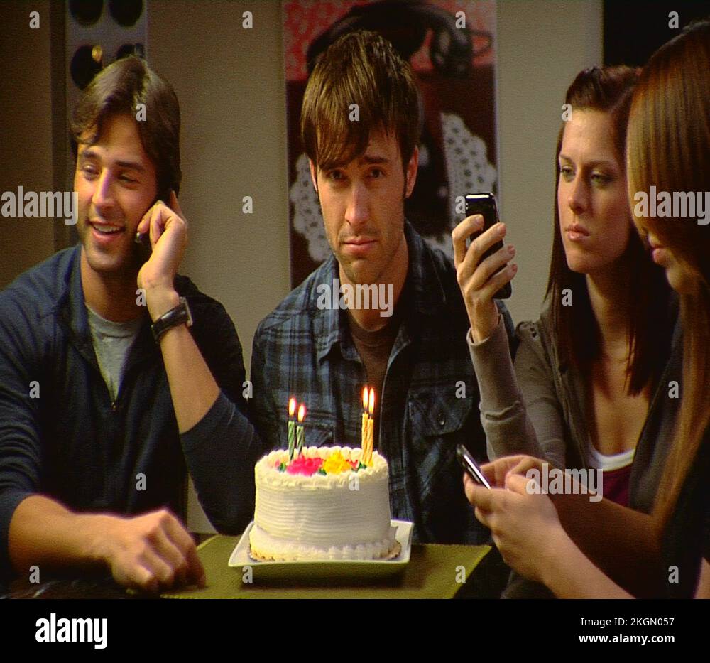 MS, Lockdown, A man with a birthday cake surrounded by friends who are ...