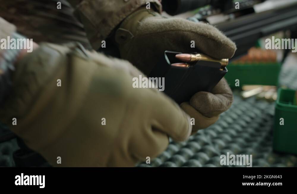 Sniper rifle bullets. Slow Motio. 4K. Red Epic. Smooth cinematic glide ...