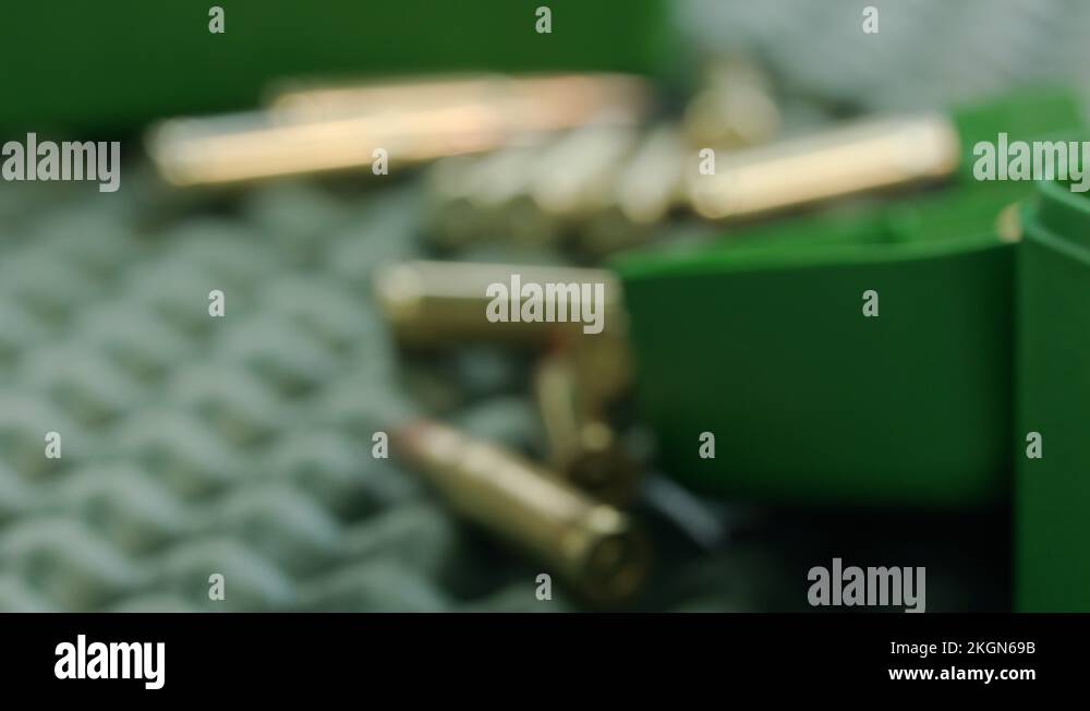 Rifle ammo. Slow Motion. Shot on Cinema Camera in 4K (UHD Stock Video ...