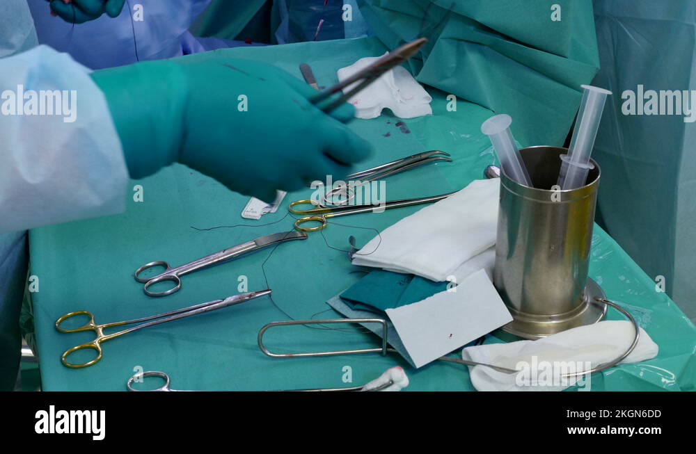 Surgical nurse using medical tools during operation Stock Video Footage ...