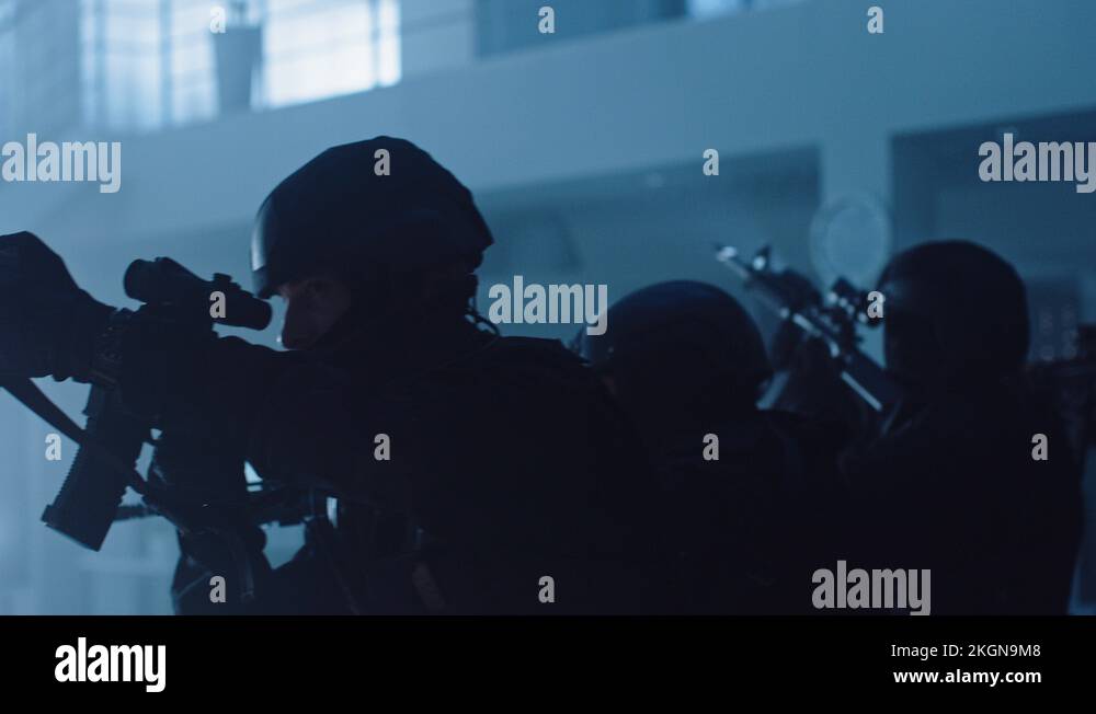 Close Up Portraits of Masked Squad of Armed SWAT Police Officers Storm ...