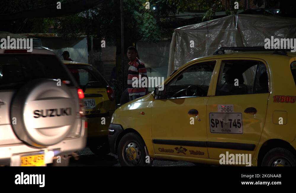 Taxis in traffic Stock Videos & Footage - HD and 4K Video Clips - Alamy