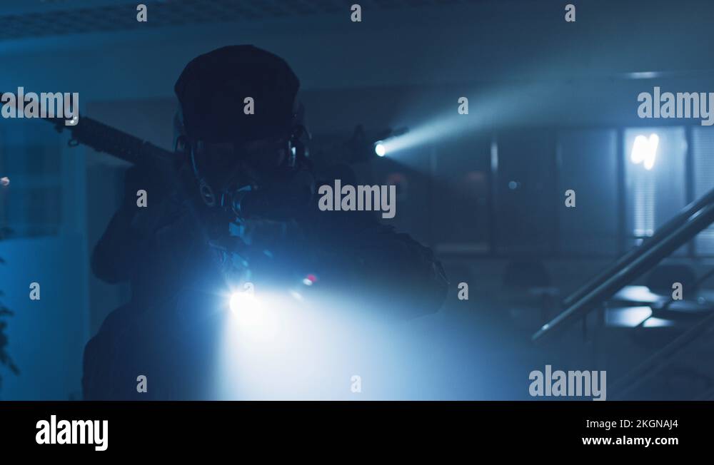 Close Up Portraits of Masked Squad of Armed SWAT Police Officers Storm ...