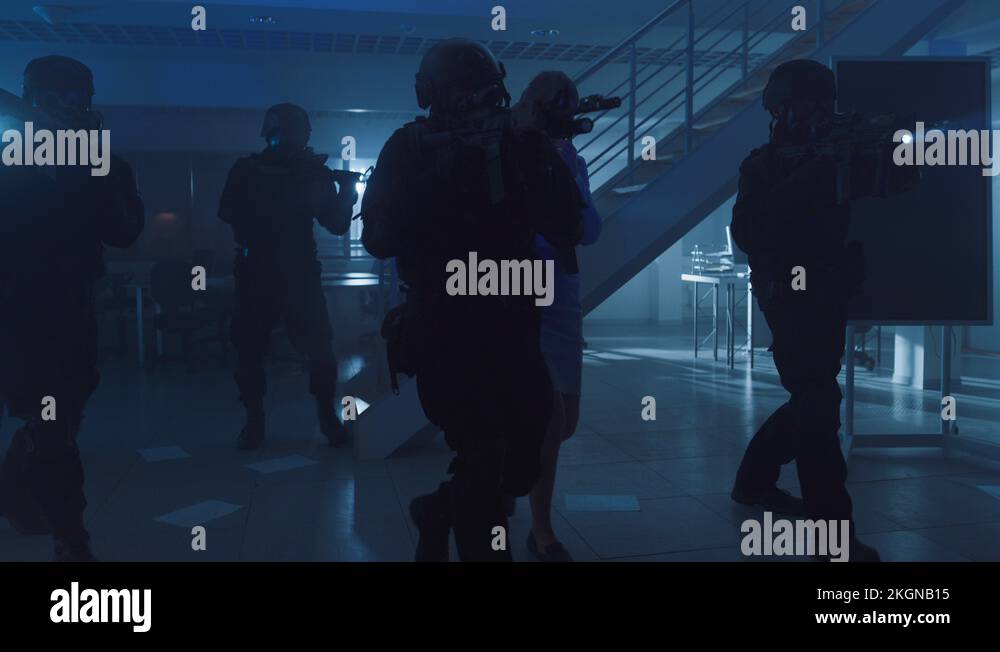 Masked Squad of Armed SWAT Police Officers Rescue a Female Hostage in ...