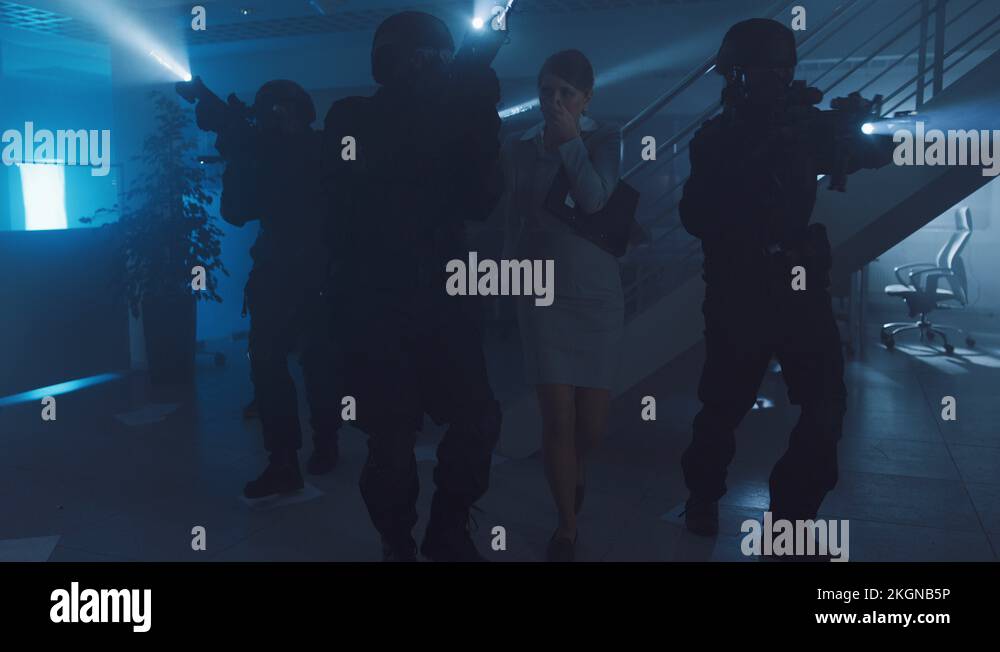Masked Squad of Armed SWAT Police Officers Rescue a Female Hostage in ...