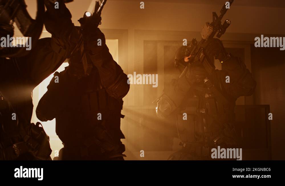 Masked Team of Armed SWAT Police Officers Slowly Move in a Hall of a ...