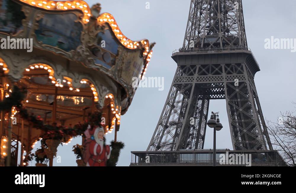 Eiffel Tower and Carousel (merry go round) in Paris, France, French ...