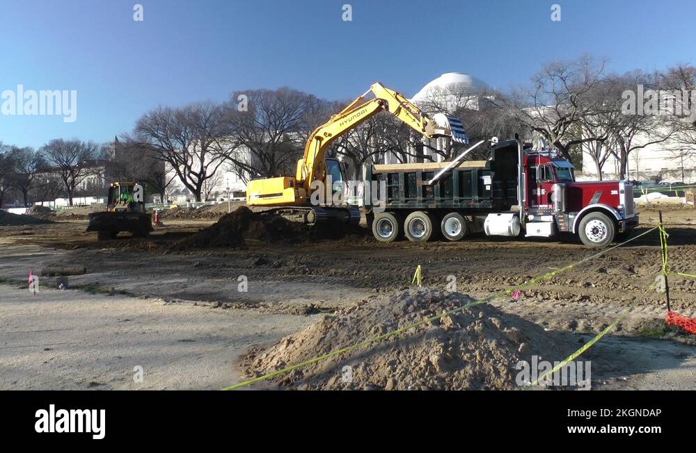National Mall renovation front loader moves earth to dump truck Stock ...