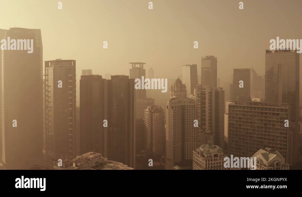 Skyscraper behind unhealthy fog of air pollution Stock Video Footage ...