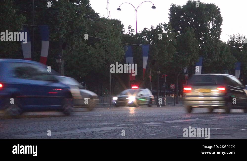 Paris Downtown Car Traffic on Champs-Elysees Boulevard in Crepuscle ...