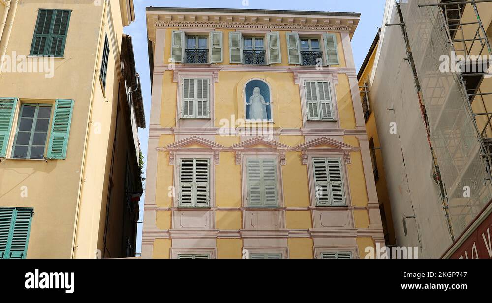 Virgin Mary Sculpture On The Facade Of A House In Menton France Stock ...