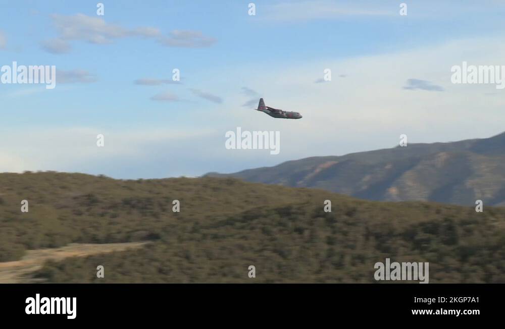 C-130 Hercules Modular Airborne Fire Fighting System flying over ...