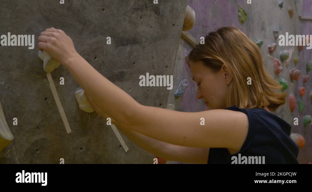 Woman climbing wall Stock Videos & Footage - HD and 4K Video Clips - Alamy