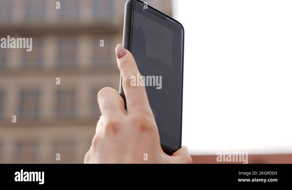 Spectator man on opener music concert raise hand shooting phone video ...