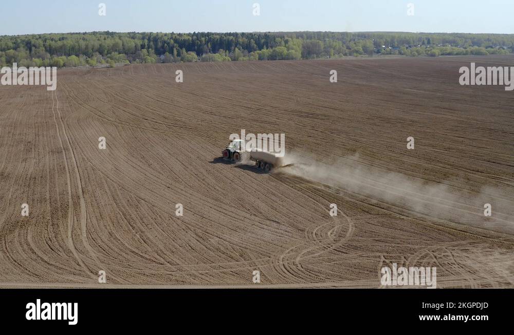 Manure tractor on an arable field spraying manure Stock Videos ...