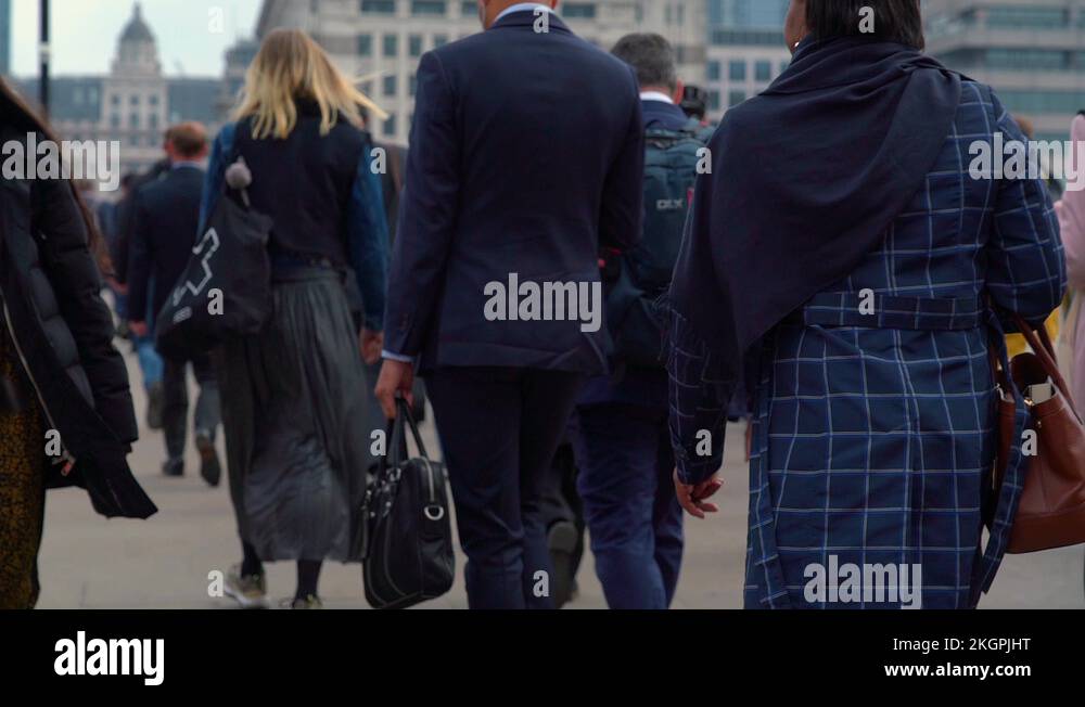 Crowd of commuters, and pedestrians. No faces visible - inception ...