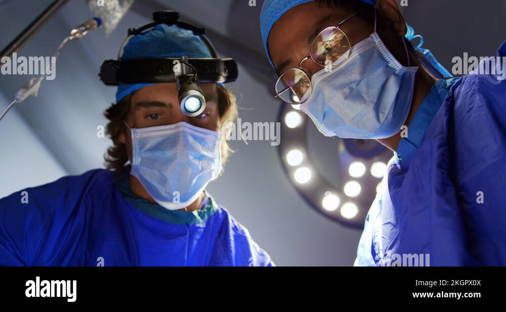 Surgeons performing operation 4k Stock Video Footage - Alamy