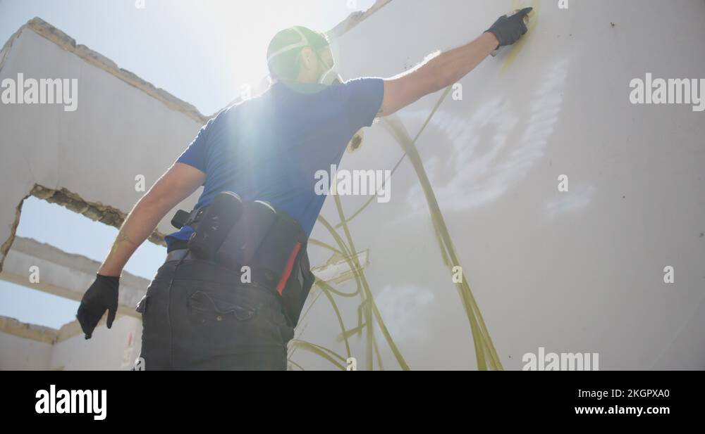 Graffiti artist painting with aerosol spray 4k Stock Video Footage - Alamy