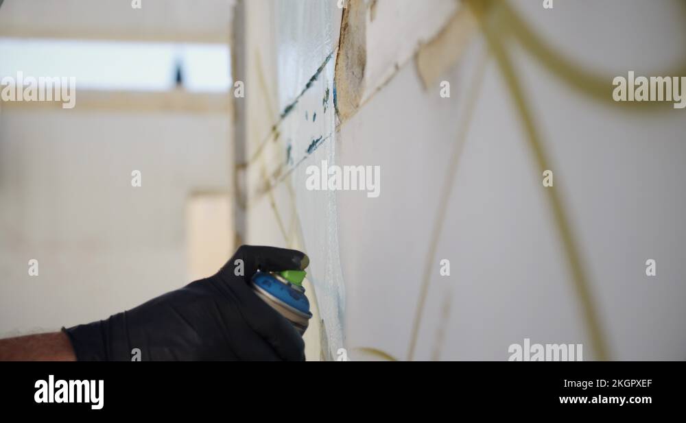 Graffiti artist painting with aerosol spray 4k Stock Video Footage - Alamy