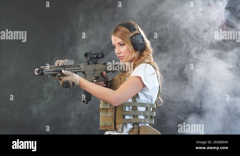 Woman soldier sniper in disguise with a sniper rifle, slow motion Stock ...