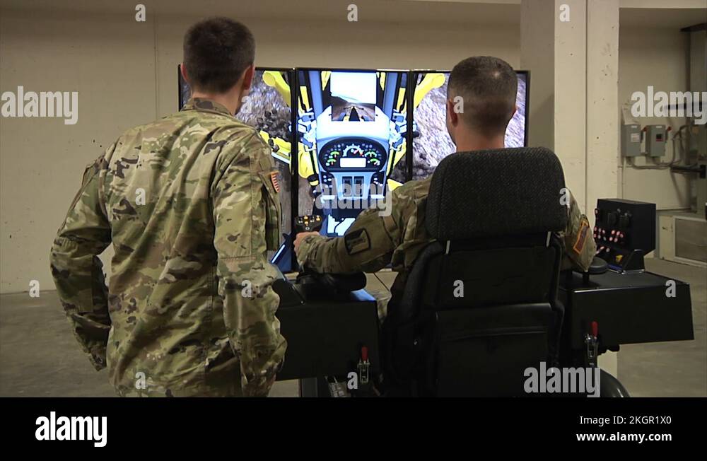Soldier training to operate heavy construction plant using simulator ...
