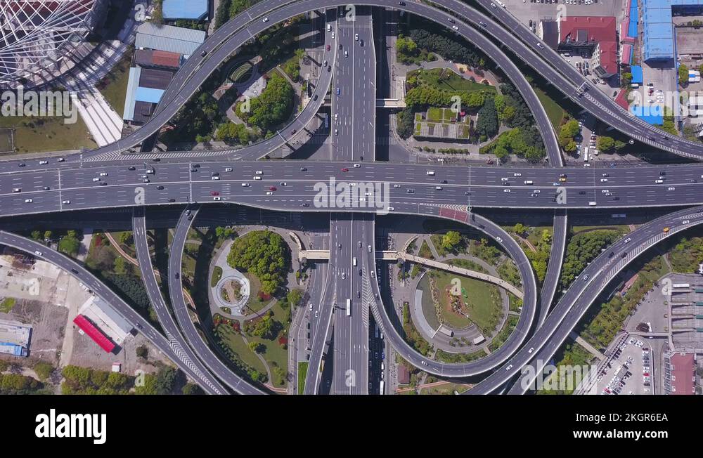 Aerial view of highway junctions with roundabout. Bridge roads shape ...