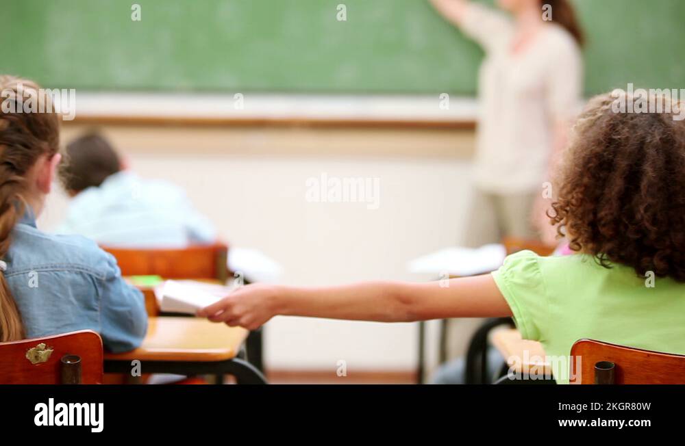 Passing a note Stock Videos & Footage - HD and 4K Video Clips - Alamy