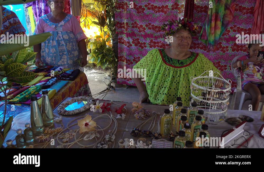 Polynesian market stall sells coconut oil and Tiare, Vaitape, Bora Bora ...