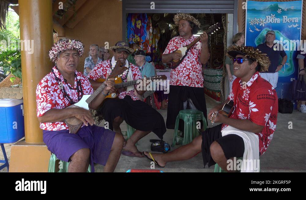 Polynesian men play local music, Vaitape, Bora Bora, French Polynesia ...