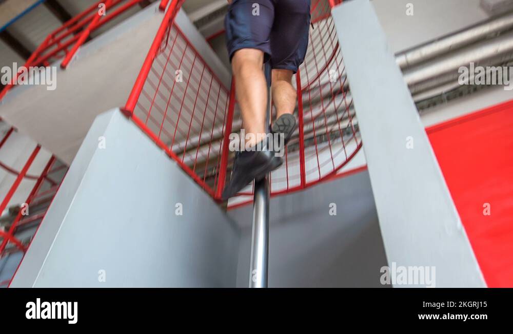 Going down a pole in order to start a firefighting operation Stock ...