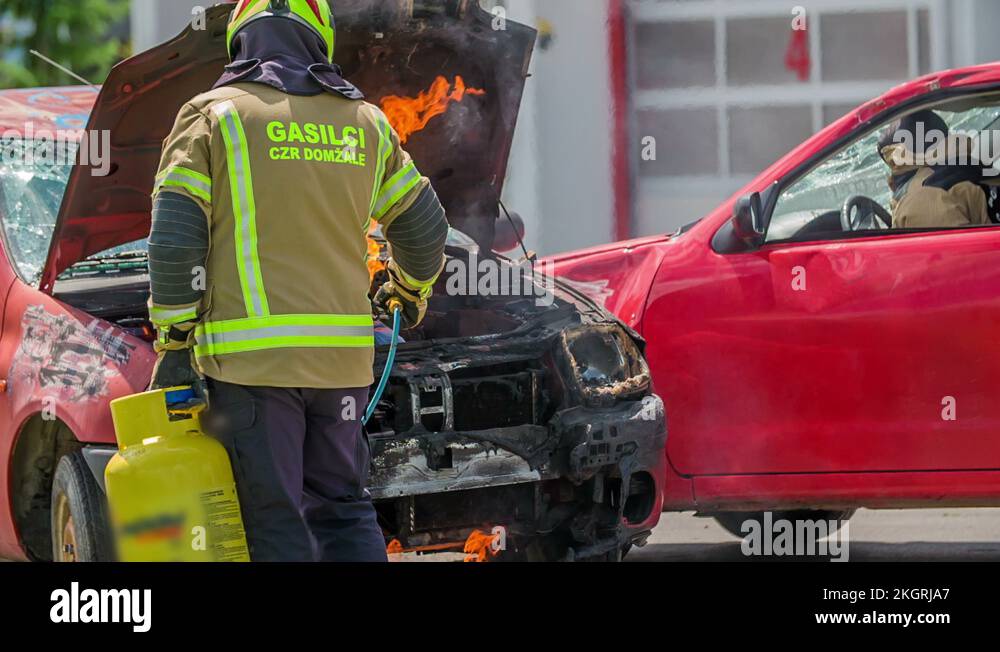 Firefighter is extinguishing a fire with a gas bottle Stock Video ...