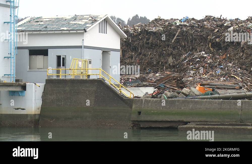 Japan Tsunami 1 Year On - Massive Pile Of Tsunami Debris Stock Video ...