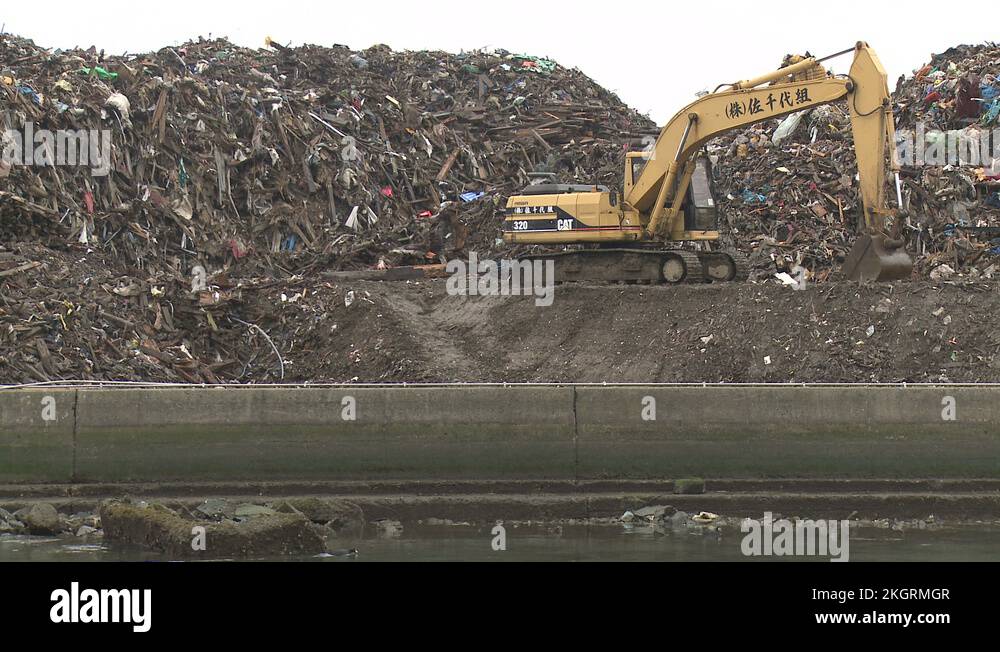 Japan Tsunami 1 Year On - Massive Pile Of Tsunami Debris Stock Video ...