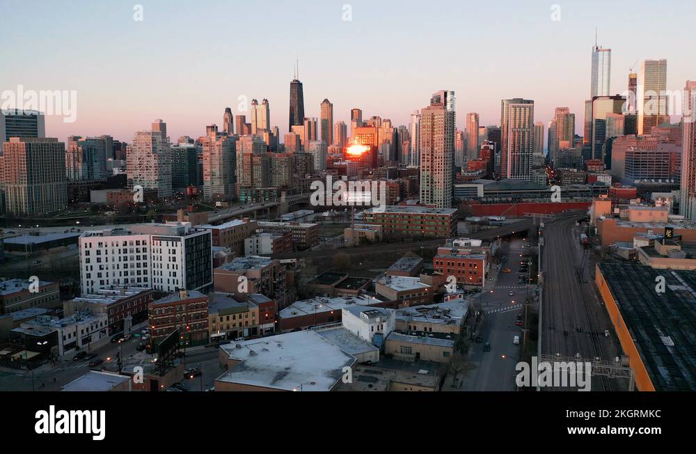 Late Sunset reflecrs on buildings and streets of the downtown urban ...