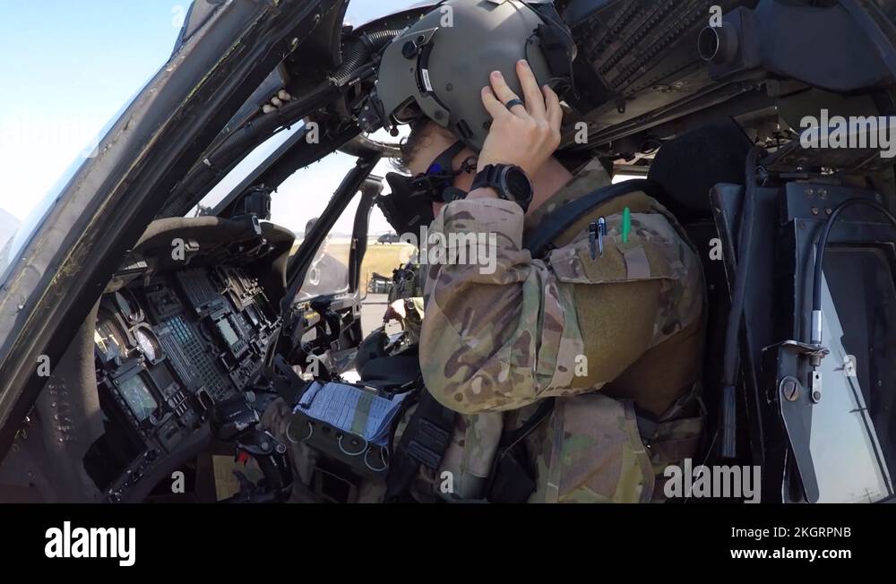 HH-60 Pave Hawk pilot securing flying helmet Stock Video Footage - Alamy