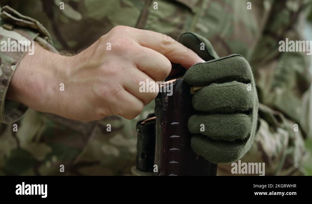 Kalashnikov rifle charging. Close up of charging rifle Stock Video ...